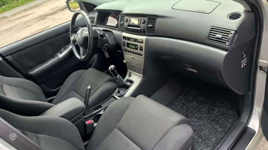 Grey Toyota Corolla 2006 in Vilnius, with an engine capacity of 2.00 L and mileage of 250 thousand km for 1900 €, photo 33 on AUTOMOTO.COM.LV