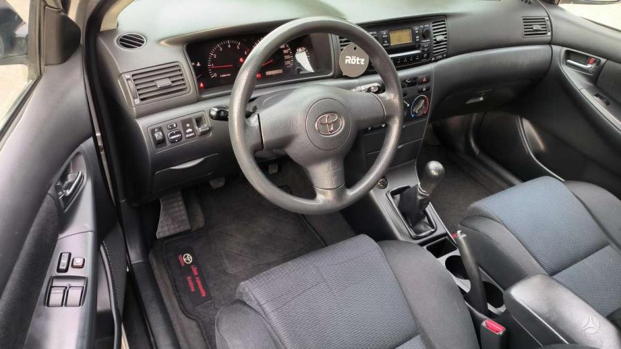 Grey Toyota Corolla 2006 in Vilnius, with an engine capacity of 1.40 L and mileage of 215 thousand km for 1700 €, photo 15 on AUTOMOTO.COM.LV