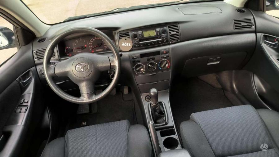 Grey Toyota Corolla 2006 in Vilnius, with an engine capacity of 1.40 L and mileage of 215 thousand km for 1700 €, photo 16 on AUTOMOTO.COM.LV