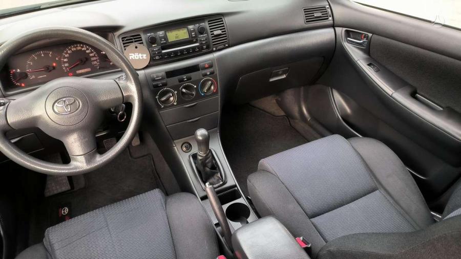 Grey Toyota Corolla 2006 in Vilnius, with an engine capacity of 1.40 L and mileage of 215 thousand km for 1700 €, photo 21 on AUTOMOTO.COM.LV