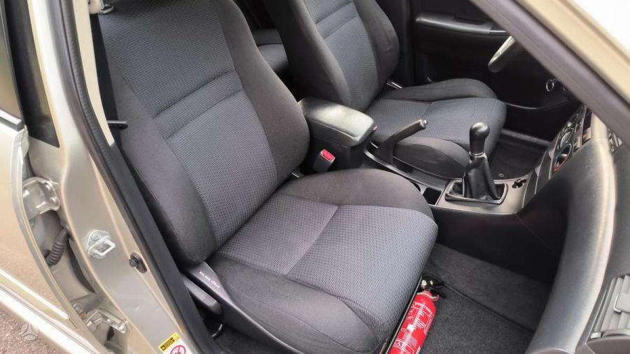 Grey Toyota Corolla 2006 in Vilnius, with an engine capacity of 1.40 L and mileage of 215 thousand km for 1700 €, photo 25 on AUTOMOTO.COM.LV