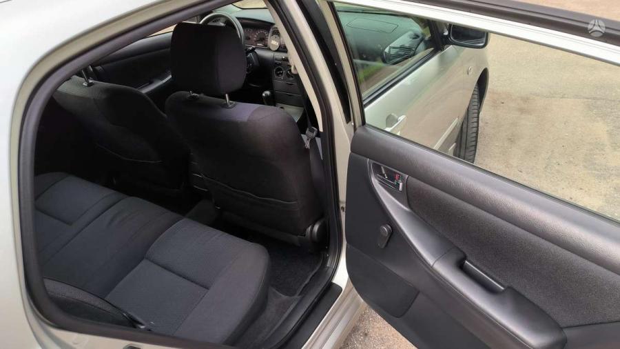 Grey Toyota Corolla 2006 in Vilnius, with an engine capacity of 1.40 L and mileage of 215 thousand km for 1700 €, photo 26 on AUTOMOTO.COM.LV