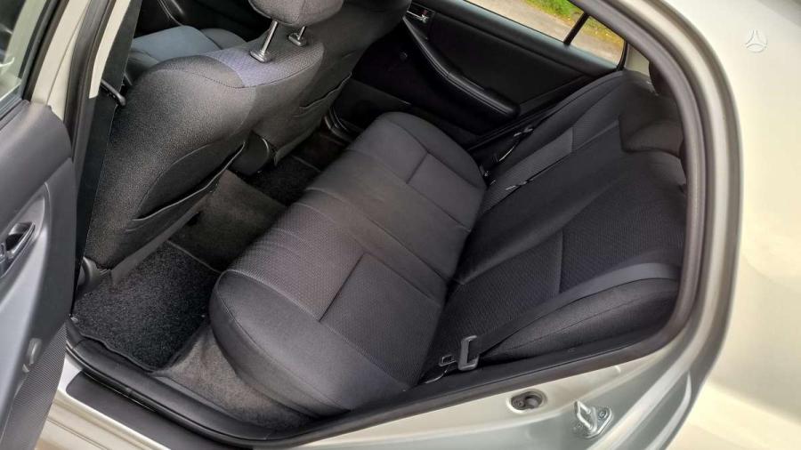 Grey Toyota Corolla 2006 in Vilnius, with an engine capacity of 1.40 L and mileage of 215 thousand km for 1700 €, photo 28 on AUTOMOTO.COM.LV
