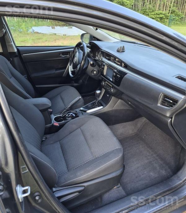 Grey Toyota Corolla 2014 in Riga, with an engine capacity of 1.60 L and mileage of 137 thousand km for 6500 €, photo 9 on AUTOMOTO.COM.LV