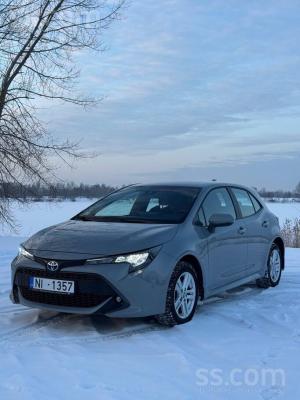Pelēks Toyota Corolla 2022 Rīga, ar dzinēja tilpumu 1.80 L un nobraukumu 74 tūkst. km par 18200 €, foto  vietnē AUTOMOTO.COM.LV