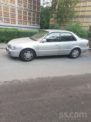 Pelēks Toyota Corolla 2000 Rīga, ar dzinēja tilpumu 1.60 L un nobraukumu 194 tūkst. km par 1300 €, foto  vietnē AUTOMOTO.COM.LV