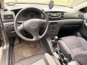 Pelēks Toyota Corolla 2002 Rīga, ar dzinēja tilpumu 1.60 L un nobraukumu 219 tūkst. km par 1000 €, foto 5 vietnē AUTOMOTO.COM.LV