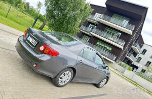 Pelēks Toyota Corolla 2008 Rīga, ar dzinēja tilpumu 1.60 L un nobraukumu 163 tūkst. km par 3200 €, foto 4 vietnē AUTOMOTO.COM.LV