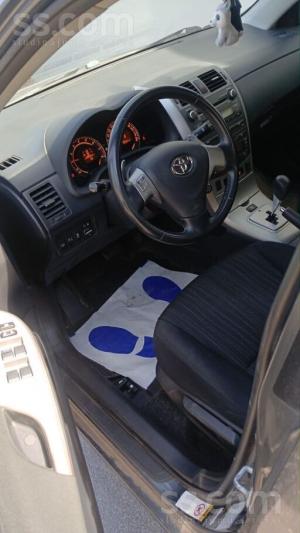 Pelēks Toyota Corolla 2008 Rīga, ar dzinēja tilpumu 1.60 L un nobraukumu 300 tūkst. km par 2900 €, foto 8 vietnē AUTOMOTO.COM.LV