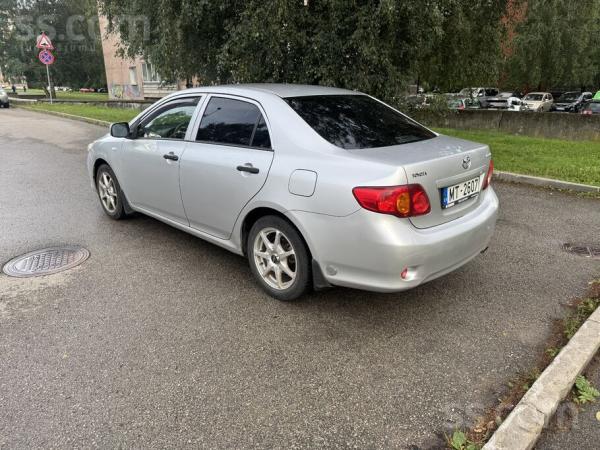 Grey Toyota Corolla 2008 in Riga, with an engine capacity of 1.60 L and mileage of 335 thousand km for 2400 €, photo 1 on AUTOMOTO.COM.LV