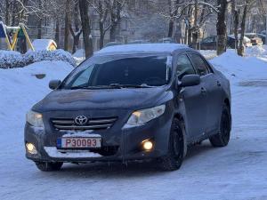 Grey Toyota Corolla 2009 in Vilnius, with an engine capacity of 1.60 L and mileage of 165 thousand km for 2950 €, photo 2 on AUTOMOTO.COM.LV
