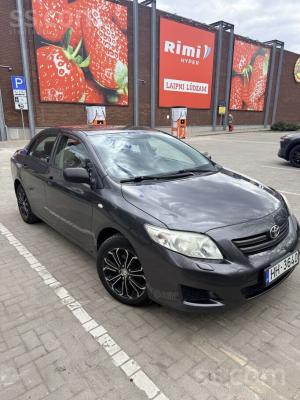 Pelēks Toyota Corolla 2009 Rīga, ar dzinēja tilpumu 1.40 L un nobraukumu 260 tūkst. km par 2200 €, foto 3 vietnē AUTOMOTO.COM.LV