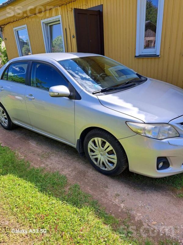 Pelēks Toyota Corolla 2011 Rīga, ar dzinēja tilpumu 1.60 L un nobraukumu 175 tūkst. km par 4300 €, foto 3 vietnē AUTOMOTO.COM.LV