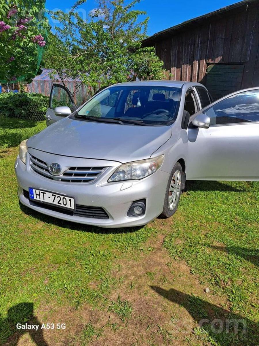 Grey Toyota Corolla 2011 in Riga, with an engine capacity of 1.60 L and mileage of 175 thousand km for 4300 €, photo 7 on AUTOMOTO.COM.LV
