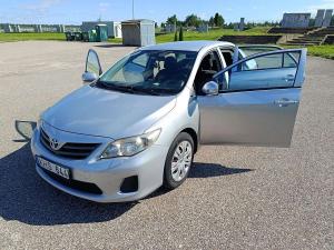 Pelēks Toyota Corolla 2012 Viļņa, ar dzinēja tilpumu 1.60 L un nobraukumu 144 tūkst. km par 4990 €, foto 14 vietnē AUTOMOTO.COM.LV