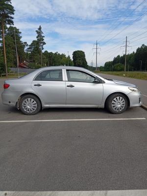 Grey Toyota Corolla 2012 in Tallinn, with an engine capacity of 1.60 L and mileage of 300 thousand km for 4000 €, photo 13 on AUTOMOTO.COM.LV