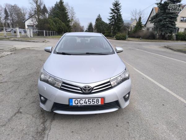Grey Toyota Corolla 2014 in Kaunas, with an engine capacity of 1.40 L and mileage of 234 thousand km for 7750 €, photo 2 on AUTOMOTO.COM.LV