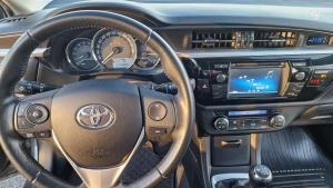 Grey Toyota Corolla 2014 in Vilnius, with an engine capacity of 1.36 L and mileage of 102 thousand km for 8600 €, photo 9 on AUTOMOTO.COM.LV