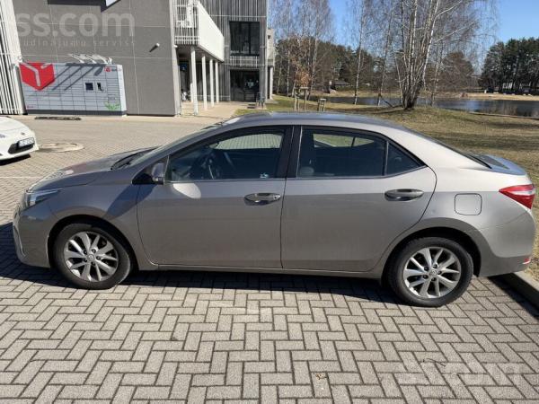 Pelēks Toyota Corolla 2014 Rīga, ar dzinēja tilpumu 1.60 L un nobraukumu 289 tūkst. km par 4900 €, foto 2 vietnē AUTOMOTO.COM.LV