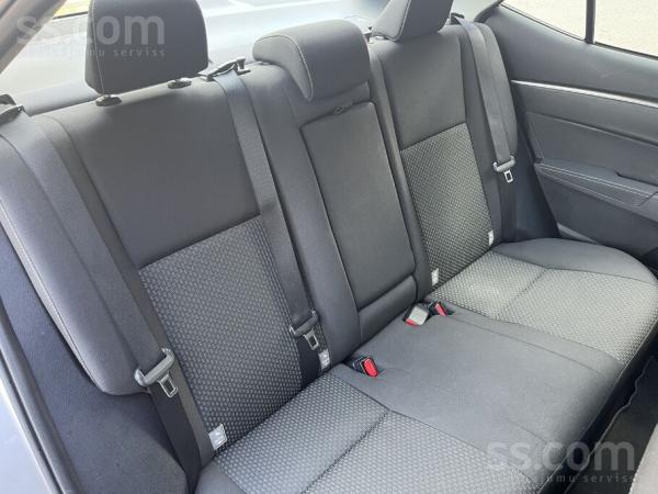Grey Toyota Corolla 2014 in Riga, with an engine capacity of 1.60 L and mileage of 252 thousand km for 6990 €, photo 8 on AUTOMOTO.COM.LV