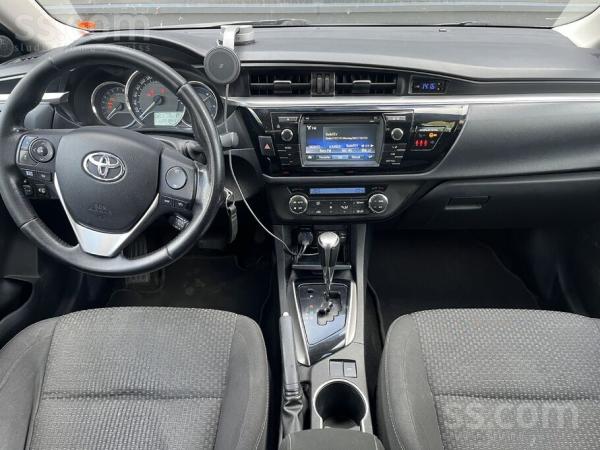 Grey Toyota Corolla 2014 in Riga, with an engine capacity of 1.60 L and mileage of 252 thousand km for 6990 €, photo 9 on AUTOMOTO.COM.LV