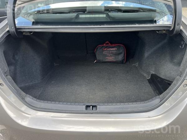 Grey Toyota Corolla 2014 in Riga, with an engine capacity of 1.60 L and mileage of 252 thousand km for 6990 €, photo 11 on AUTOMOTO.COM.LV