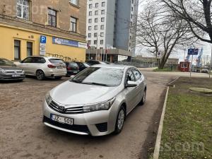 Pelēks Toyota Corolla 2015 Rīga, ar dzinēja tilpumu 1.60 L un nobraukumu 285 tūkst. km par 5400 €, foto  vietnē AUTOMOTO.COM.LV