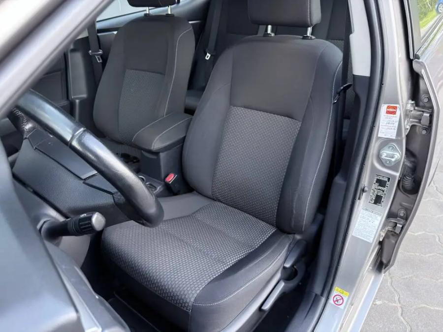 Grey Toyota Corolla 2015 in Riga, with an engine capacity of 1.60 L and mileage of 126 thousand km for 7495 €, photo 12 on AUTOMOTO.COM.LV