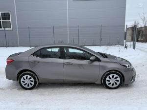 Grey Toyota Corolla 2016 in Vilnius, with an engine capacity of 1.60 L and mileage of 312 thousand km for 6900 €, photo 4 on AUTOMOTO.COM.LV