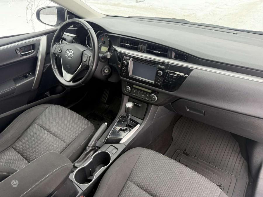 Grey Toyota Corolla 2016 in Vilnius, with an engine capacity of 1.60 L and mileage of 312 thousand km for 6900 €, photo 9 on AUTOMOTO.COM.LV
