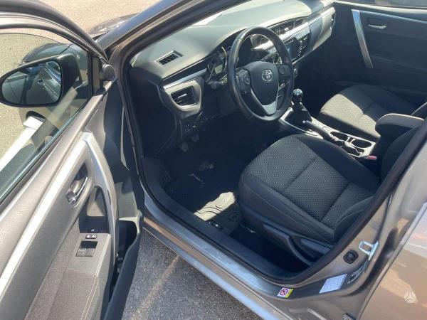 Grey Toyota Corolla 2016 in Vilnius, with an engine capacity of 1.60 L and mileage of 235 thousand km for 5700 €, photo 2 on AUTOMOTO.COM.LV