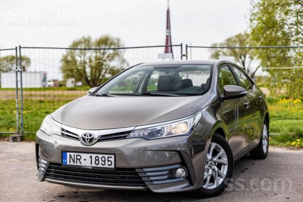 Pelēks Toyota Corolla 2017 Rīga, ar dzinēja tilpumu 1.40 L un nobraukumu 248 tūkst. km par 8990 €, foto 1 vietnē AUTOMOTO.COM.LV