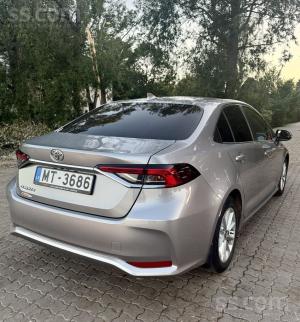 Pelēks Toyota Corolla 2021 Rīga, ar dzinēja tilpumu 1.60 L un nobraukumu 116 tūkst. km par 17500 €, foto 4 vietnē AUTOMOTO.COM.LV