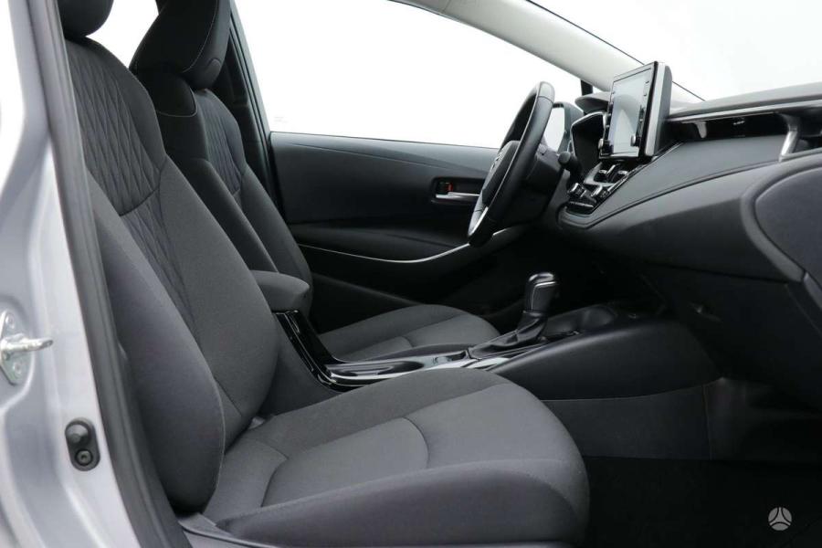 Grey Toyota Corolla 2023 in Vilnius, with an engine capacity of 1.49 L and mileage of 107 thousand km for 19900 €, photo 10 on AUTOMOTO.COM.LV