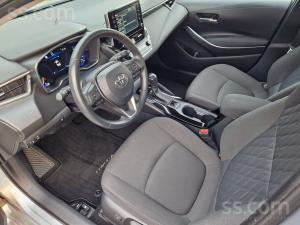 Grey Toyota Corolla 2023 in Riga, with an engine capacity of 1.50 L and mileage of 60 thousand km for 17100 €, photo 8 on AUTOMOTO.COM.LV