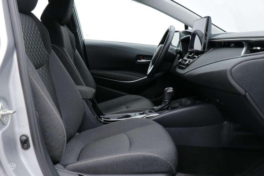 Grey Toyota Corolla 2023 in Vilnius, with an engine capacity of 1.49 L and mileage of 57 thousand km for 19900 €, photo 10 on AUTOMOTO.COM.LV