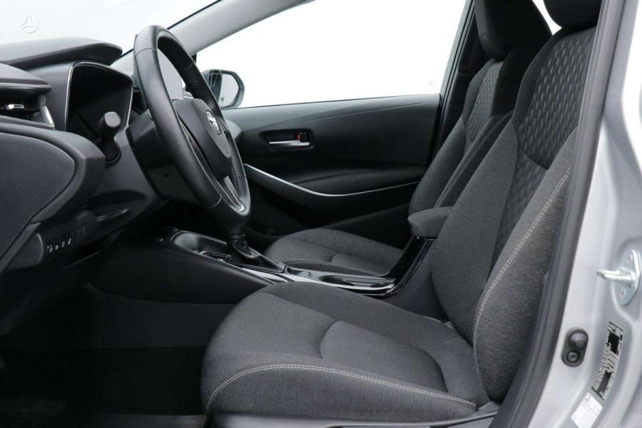 Grey Toyota Corolla 2023 in Vilnius, with an engine capacity of 1.49 L and mileage of 57 thousand km for 19900 €, photo 13 on AUTOMOTO.COM.LV