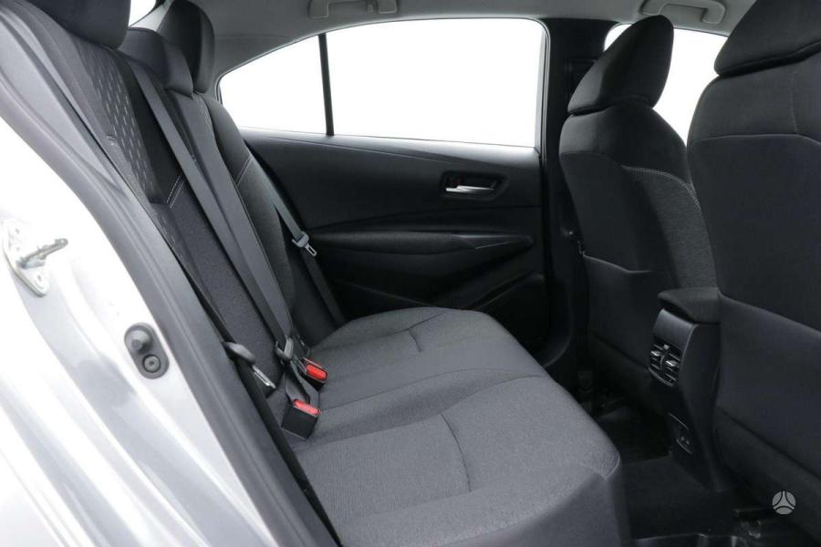 Grey Toyota Corolla 2023 in Vilnius, with an engine capacity of 1.49 L and mileage of 68 thousand km for 19900 €, photo 11 on AUTOMOTO.COM.LV