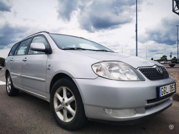 Grey Toyota Corolla 2003 in Vilnius, with an engine capacity of 2.00 L and mileage of 312 thousand km for 980 €, photo 5 on AUTOMOTO.COM.LV