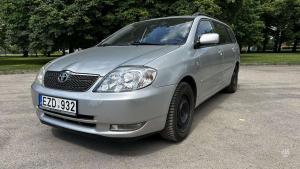Pelēks Toyota Corolla 2003 Viļņa, ar dzinēja tilpumu 2.00 L un nobraukumu 311 tūkst. km par 1900 €, foto 4 vietnē AUTOMOTO.COM.LV
