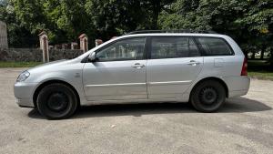 Pelēks Toyota Corolla 2003 Viļņa, ar dzinēja tilpumu 2.00 L un nobraukumu 311 tūkst. km par 1900 €, foto 6 vietnē AUTOMOTO.COM.LV