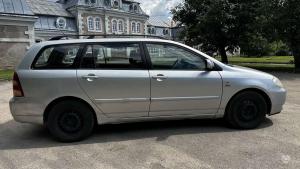 Pelēks Toyota Corolla 2003 Viļņa, ar dzinēja tilpumu 2.00 L un nobraukumu 311 tūkst. km par 1900 €, foto 9 vietnē AUTOMOTO.COM.LV