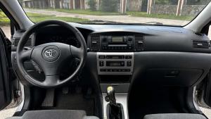 Pelēks Toyota Corolla 2003 Viļņa, ar dzinēja tilpumu 2.00 L un nobraukumu 311 tūkst. km par 1900 €, foto 13 vietnē AUTOMOTO.COM.LV