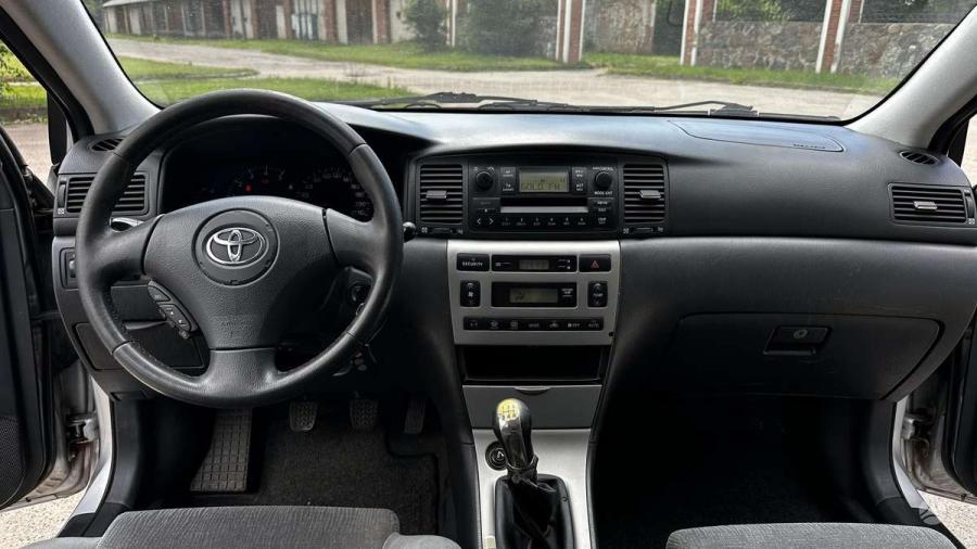 Pelēks Toyota Corolla 2003 Viļņa, ar dzinēja tilpumu 2.00 L un nobraukumu 311 tūkst. km par 1900 €, foto 13 vietnē AUTOMOTO.COM.LV