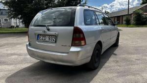 Pelēks Toyota Corolla 2003 Viļņa, ar dzinēja tilpumu 2.00 L un nobraukumu 311 tūkst. km par 1900 €, foto 17 vietnē AUTOMOTO.COM.LV