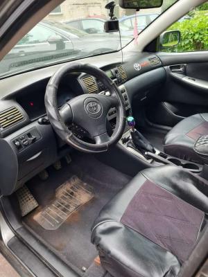 Pelēks Toyota Corolla 2003 Viļņa, ar dzinēja tilpumu 2.00 L un nobraukumu 348 tūkst. km par 600 €, foto 12 vietnē AUTOMOTO.COM.LV