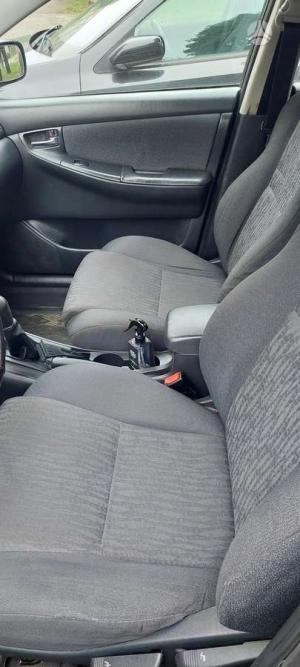 Grey Toyota Corolla 2003 in Vilnius, with an engine capacity of 1.60 L and mileage of 248 thousand km for 2200 €, photo 9 on AUTOMOTO.COM.LV