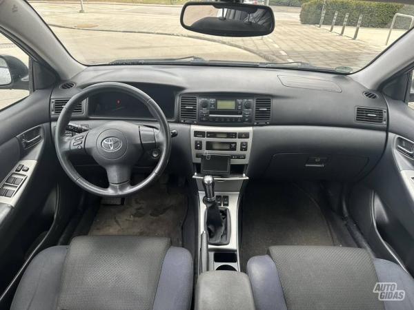 Pelēks Toyota Corolla 2004 Viļņa, ar dzinēja tilpumu 1.60 L un nobraukumu 195 tūkst. km par 2950 €, foto 7 vietnē AUTOMOTO.COM.LV
