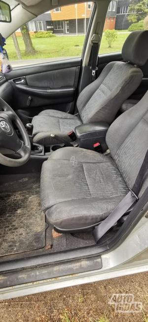 Grey Toyota Corolla 2004 in Kaunas, with an engine capacity of 1.40 L and mileage of 490 thousand km for 990 €, photo 13 on AUTOMOTO.COM.LV