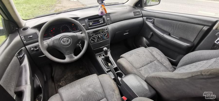 Grey Toyota Corolla 2004 in Kaunas, with an engine capacity of 1.40 L and mileage of 490 thousand km for 990 €, photo 14 on AUTOMOTO.COM.LV